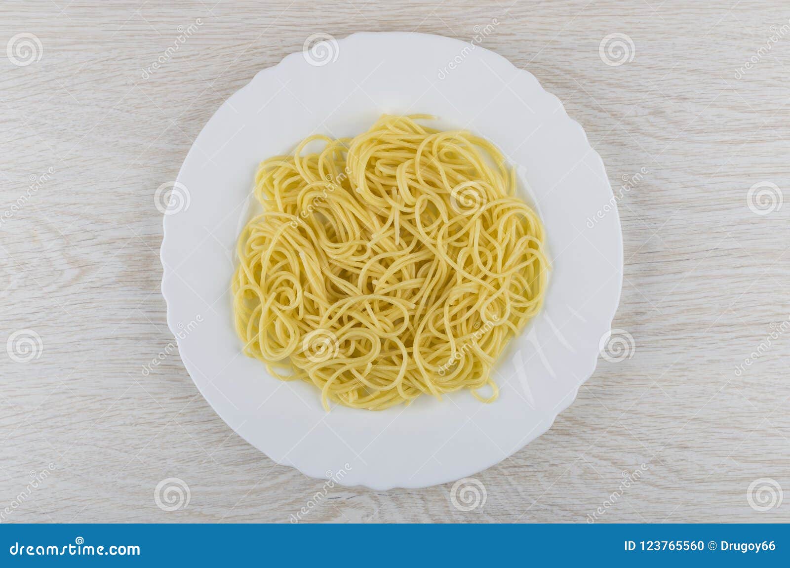 Boiled Spaghetti in White Plate on Wooden Table Stock Photo - Image of ...