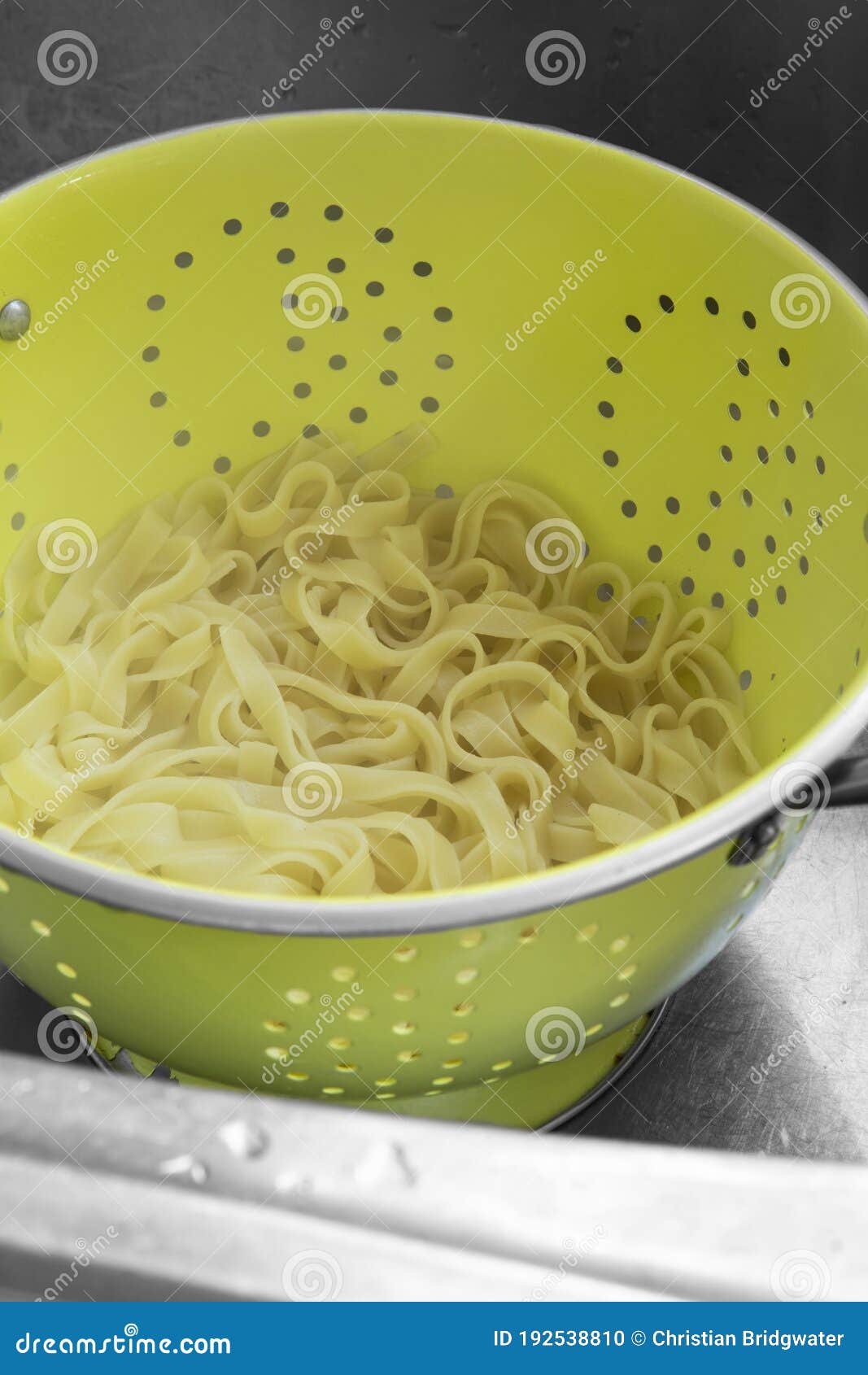 Boiled Tagliatelle Pasta Straining in a Colander Stock Photo - Image of ...