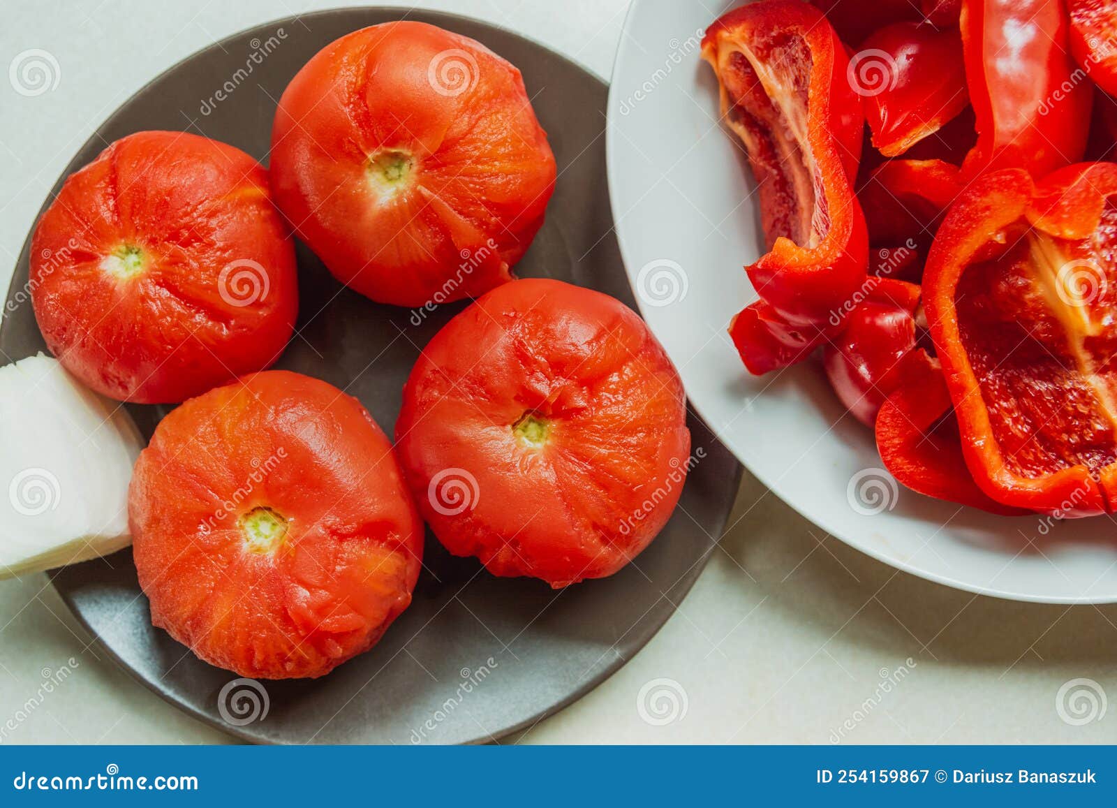 Boiled Tomatoes on a Plate with Sliced Red Pepper Stock Image - Image ...
