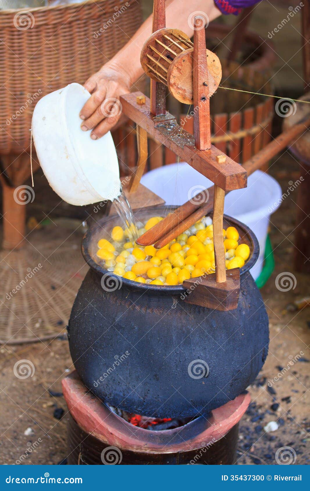 Boiling cocoons in a pot stock photo. Image of pampering - 35437300