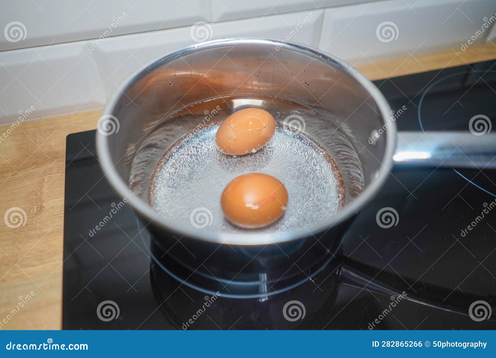 Boiling Eggs in the Silver Pot. Hard Boiled Eggs Stock Photo - Image of ...