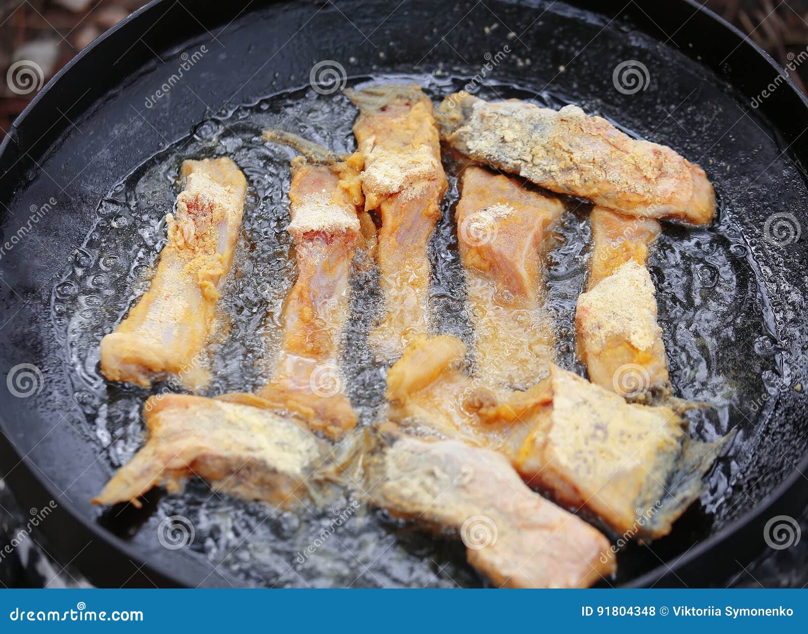 Boiling in Oil on Opened Fire, Frying Fish Fillet. Stock Photo - Image ...