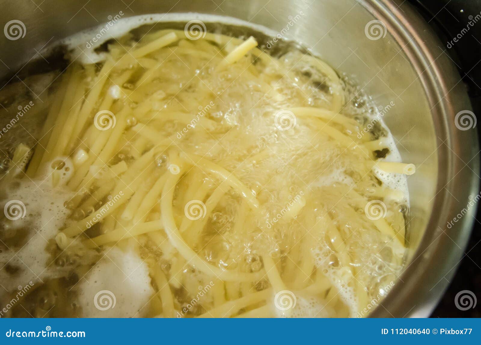 Boiling pasta in pot stock photo. Image of high, food - 112040640