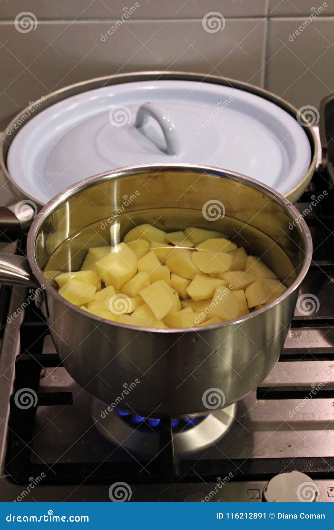 Boiling potatoes stock image. Image of adding, potato - 116212891