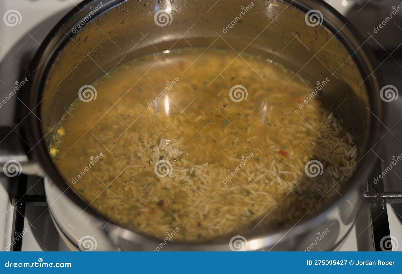 Boiling rice in pan stock image. Image of view, healthy - 275095427