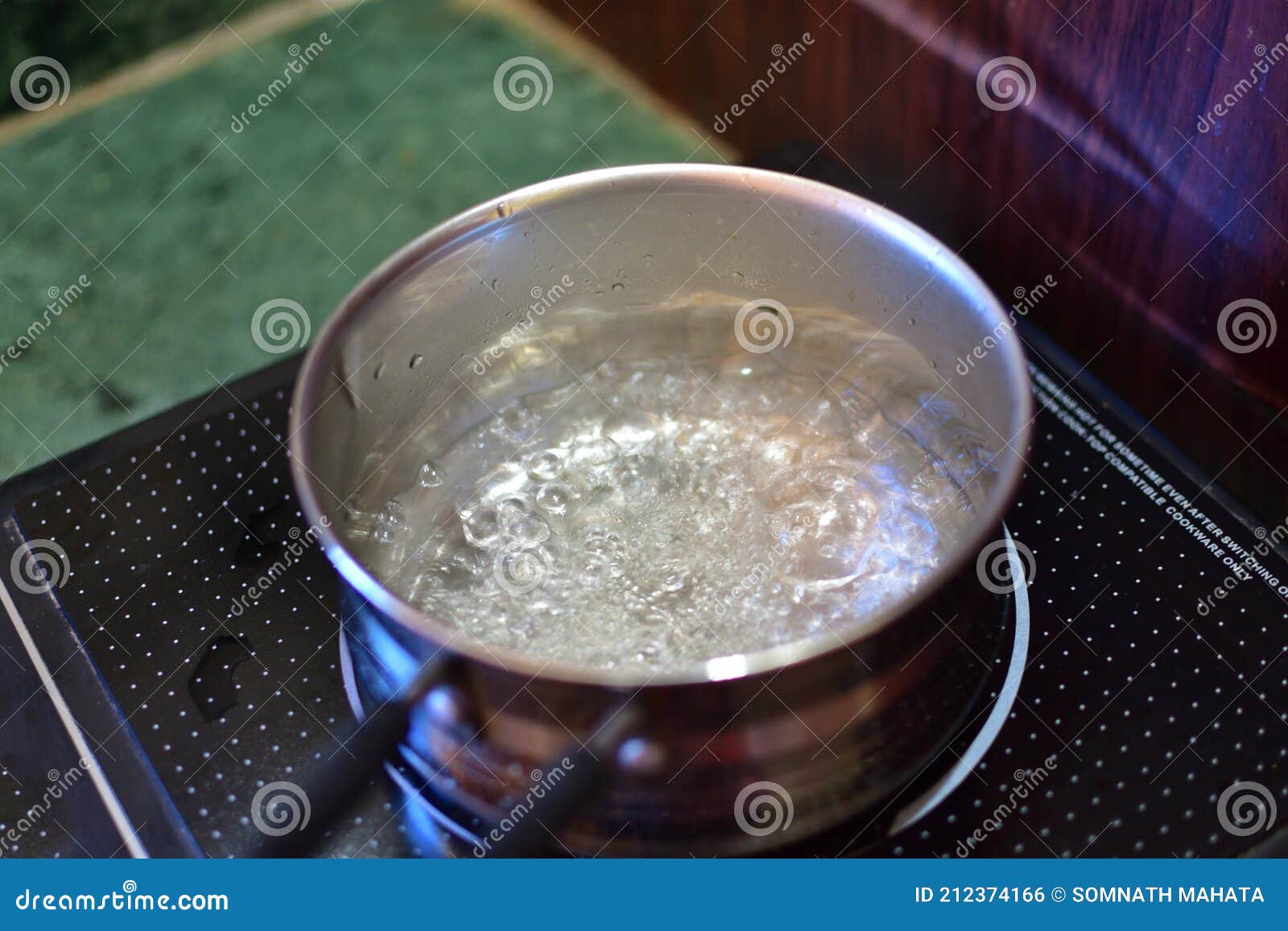 Boiling Spaghetti in Pan on Electric Stove in the Kitchen Stock Photo ...