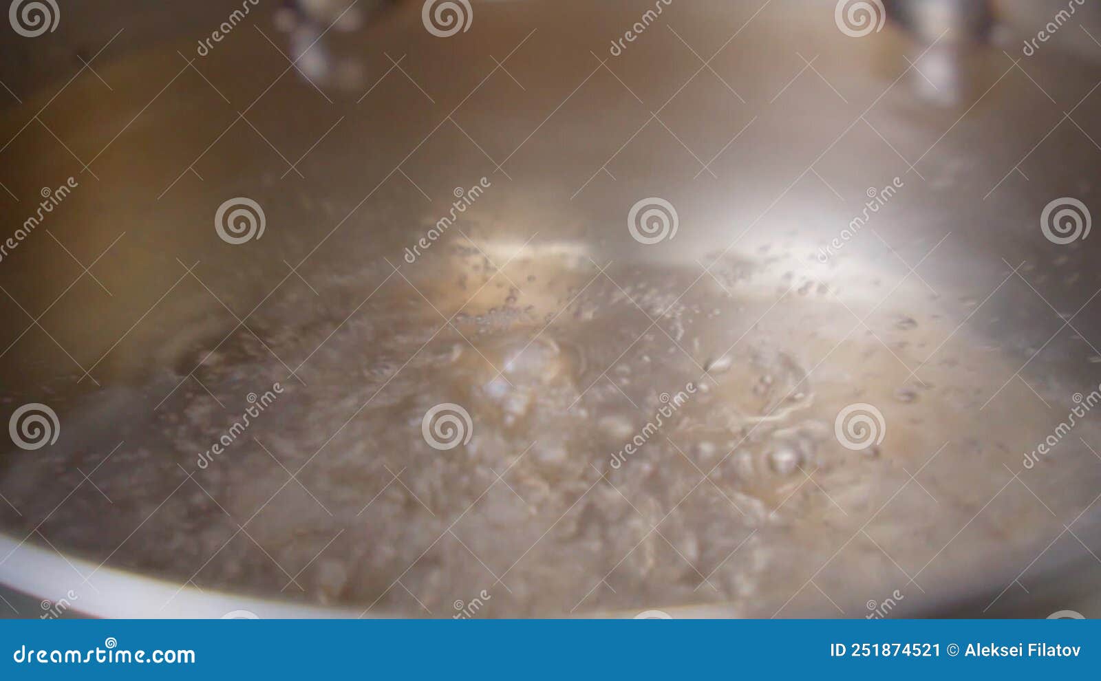Process of Boiling Water, Close-up. Bubbles of Boiling Water in a Steel ...