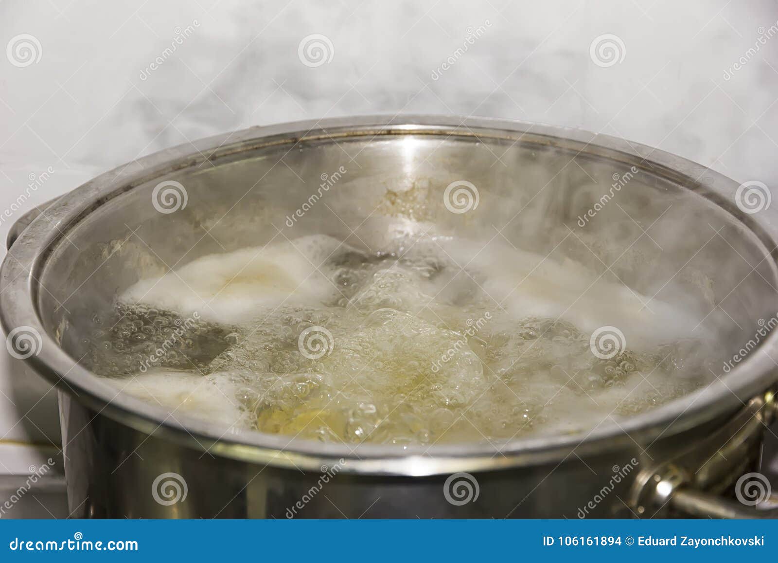 Boiling water in a pan stock photo. Image of meal, cooker - 106161894