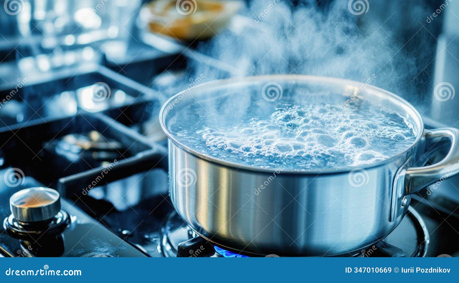 Boiling Water in Pot on Stove Creating Steam in Kitchen Stock Image ...
