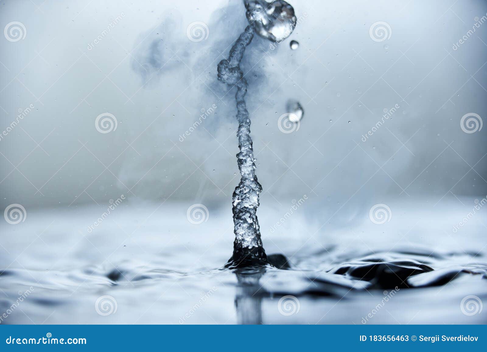 Boiling Water Splash with Steam on Blue Background Closeup Stock Image ...