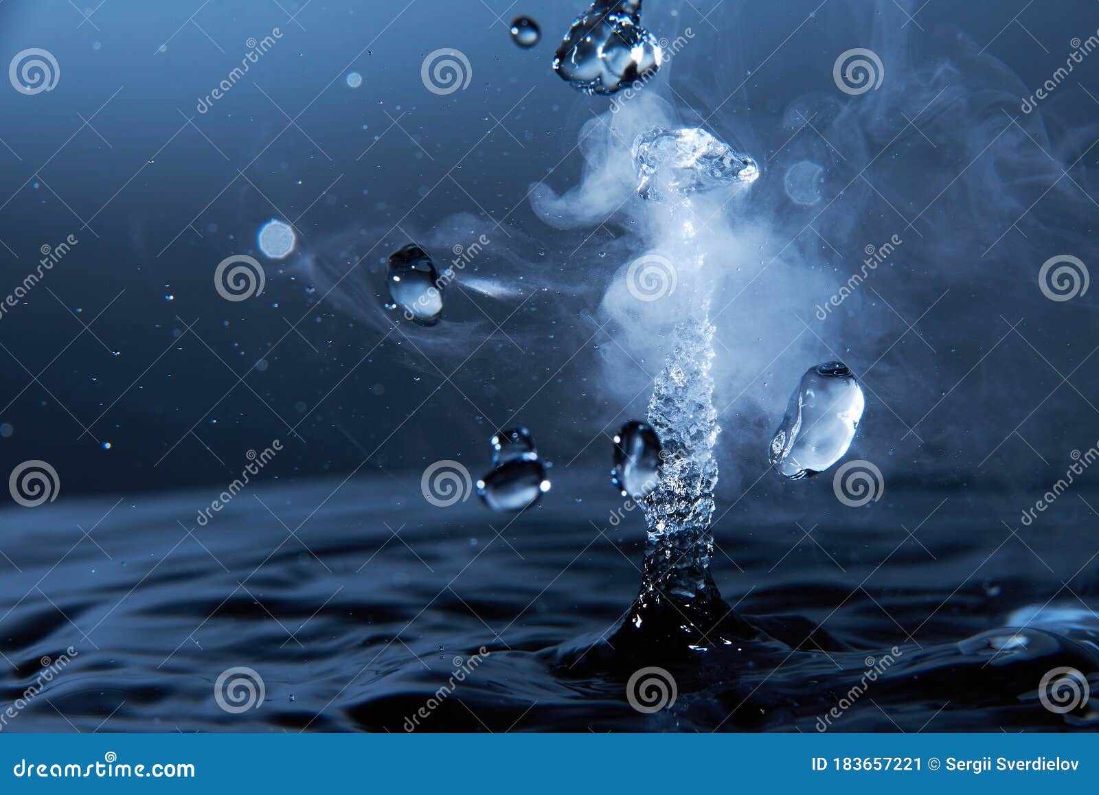 Boiling Water Splash with Steam on Dark Blue Background Closeup Stock ...