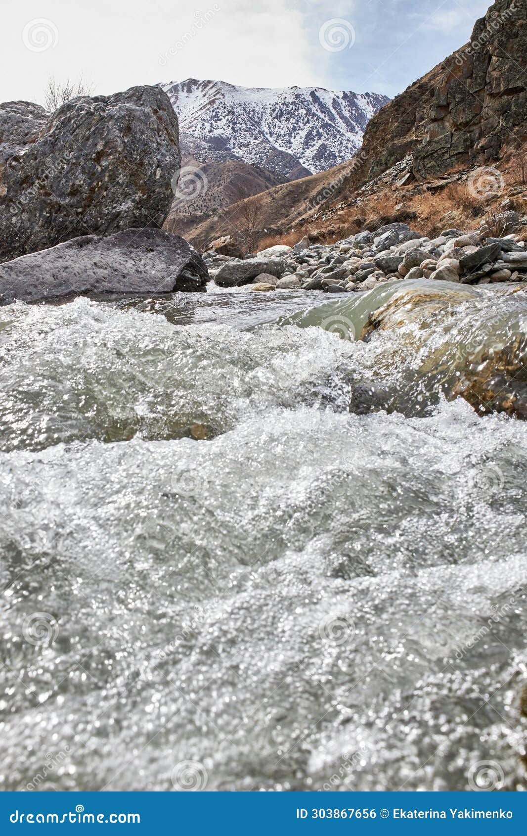 Boiling Water with Splashes in a Mountain River Against the Backdrop of ...