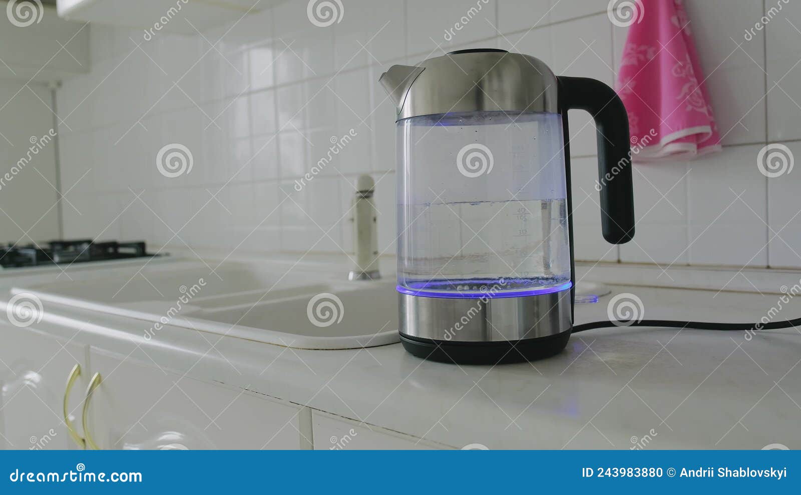 Boiling Water in a Transparent Electric Kettle in the Kitchen. the ...