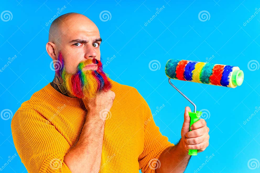 Bold Man Paint Beard in Multicolors in Blue Studio Background Stock ...