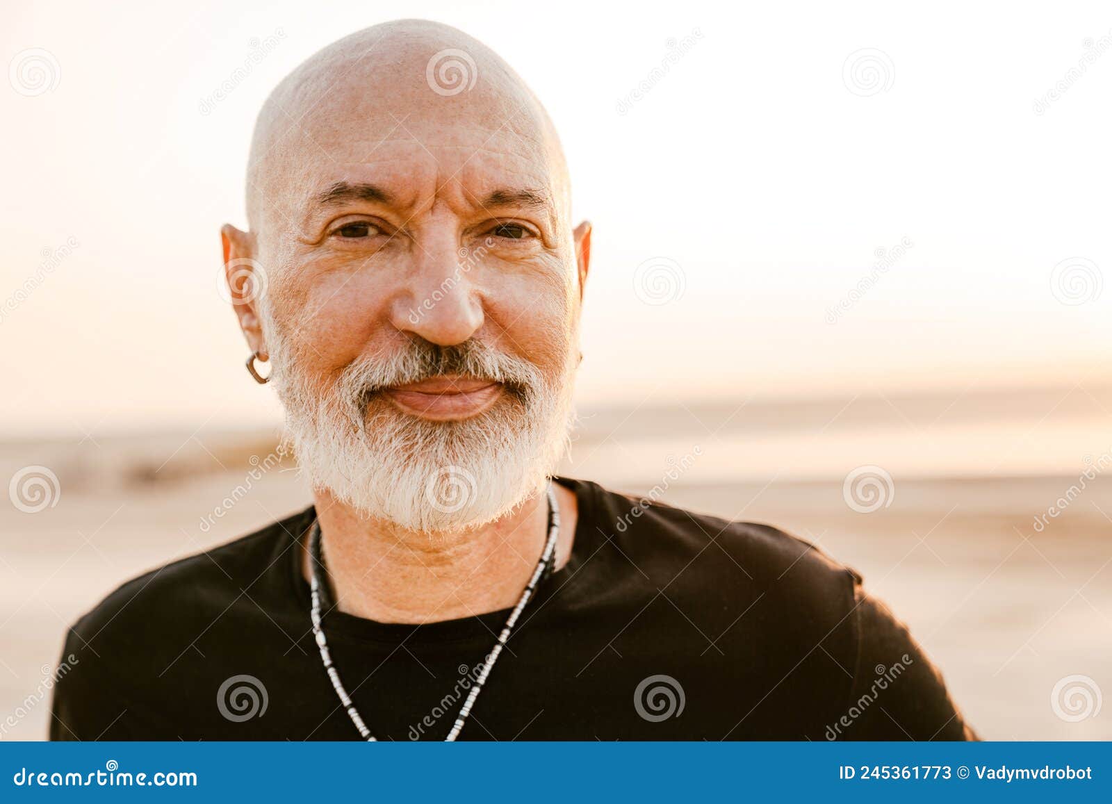 Bold Senior Man with Beard Looking at Camera Outdoors Stock Image ...