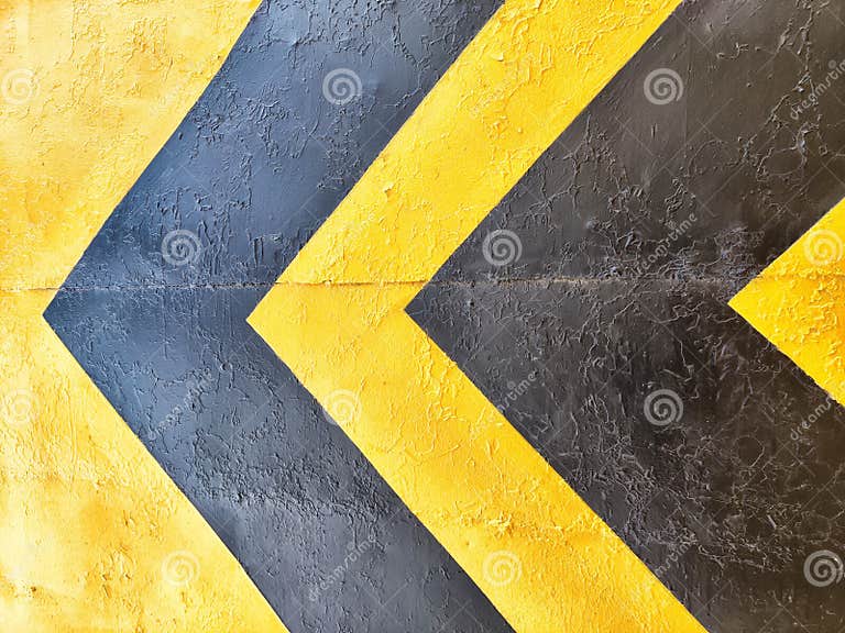 Bold Yellow and Black Chevron Design on Textured Wall Creates Dynamic ...