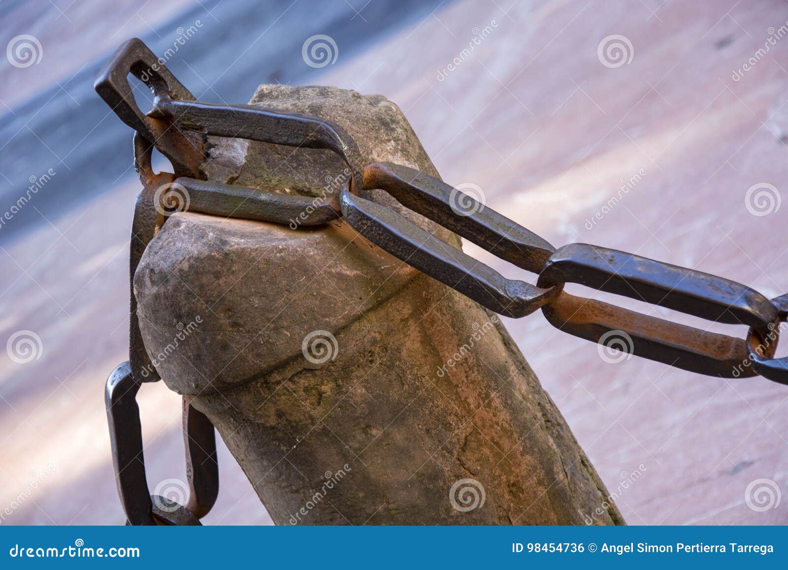 Bollard and chain 5 stock photo. Image of stonetexture - 98454736