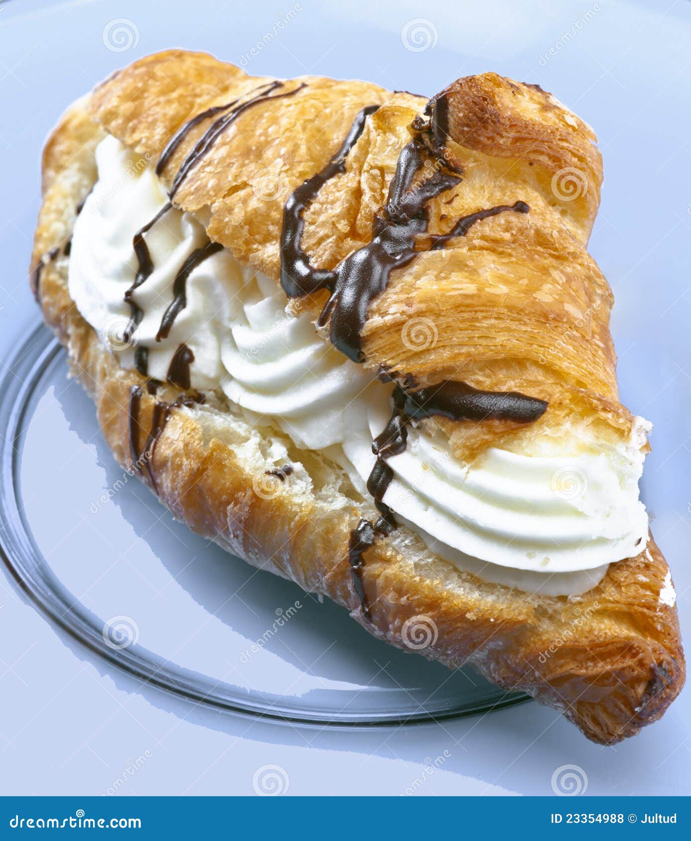 Bollo poner crema foto de archivo. Imagen de pegajoso - 23354988