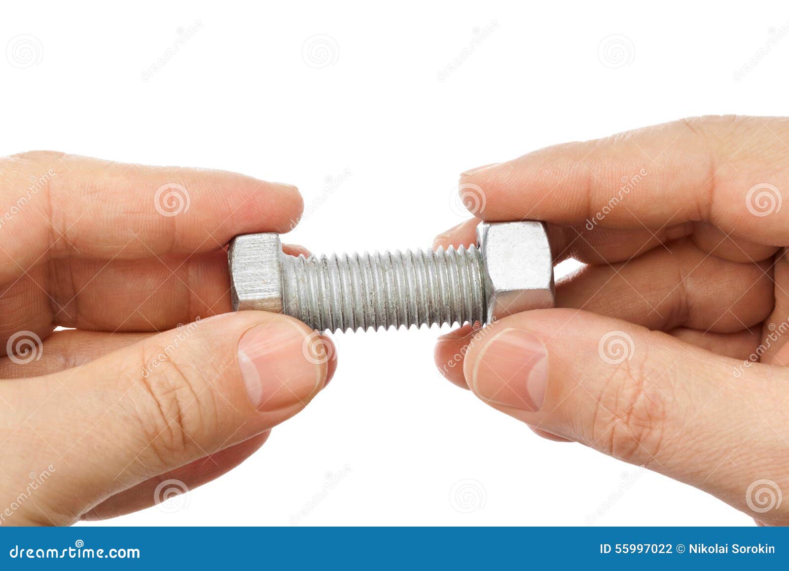 Bolt and nut in hands stock photo. Image of help, iron - 55997022