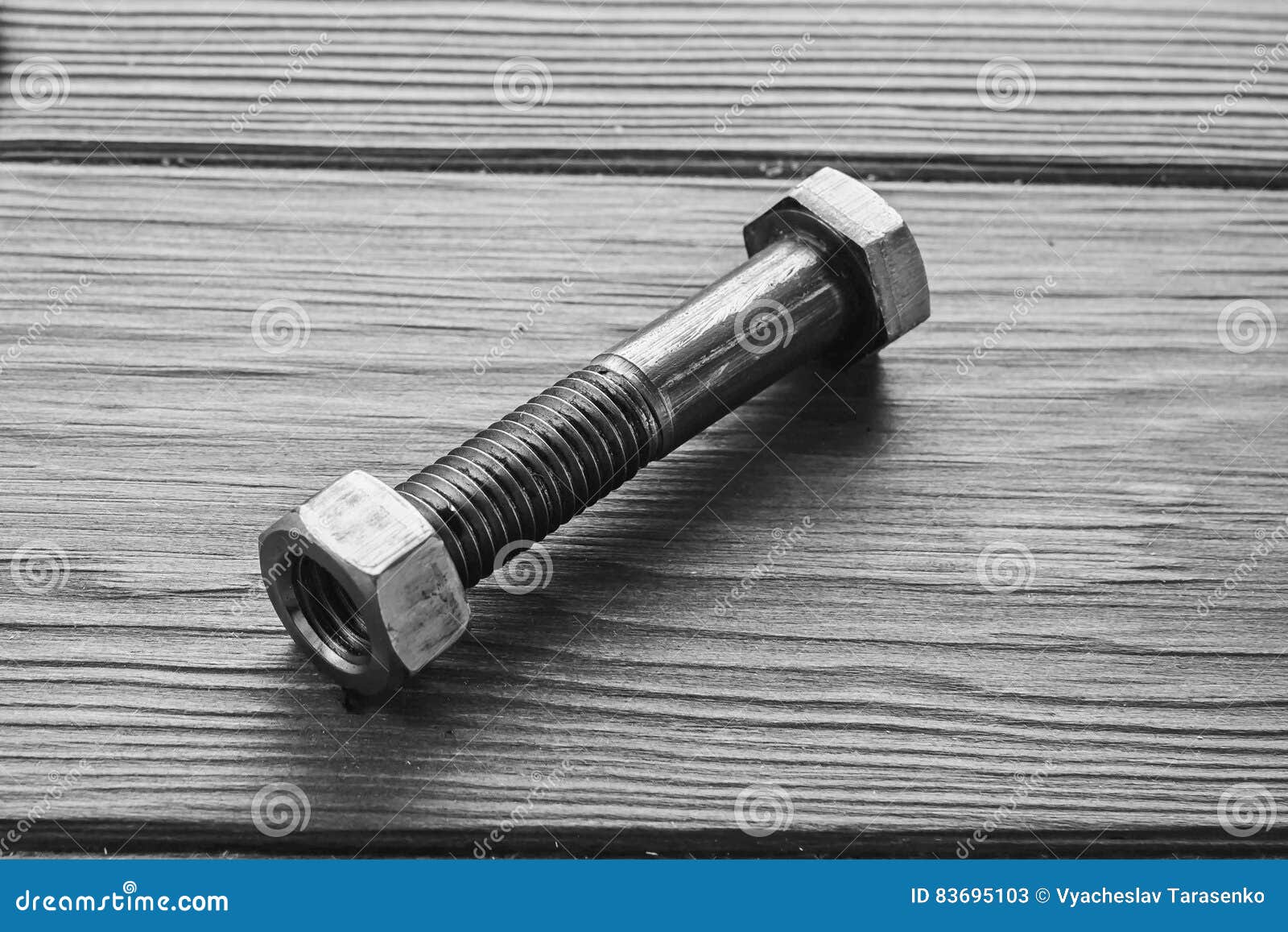 Bolt and Nut on a Wooden Texture Stock Image - Image of wooden, repair ...