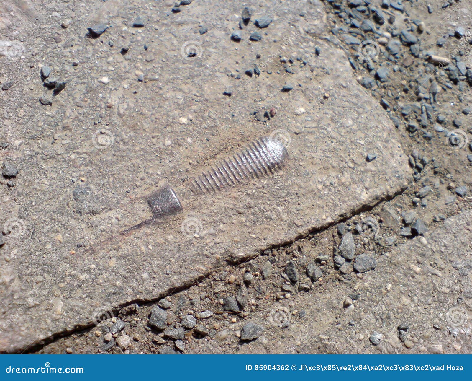 Bolt stuck in concrete stock photo. Image of tile, bolt - 85904362