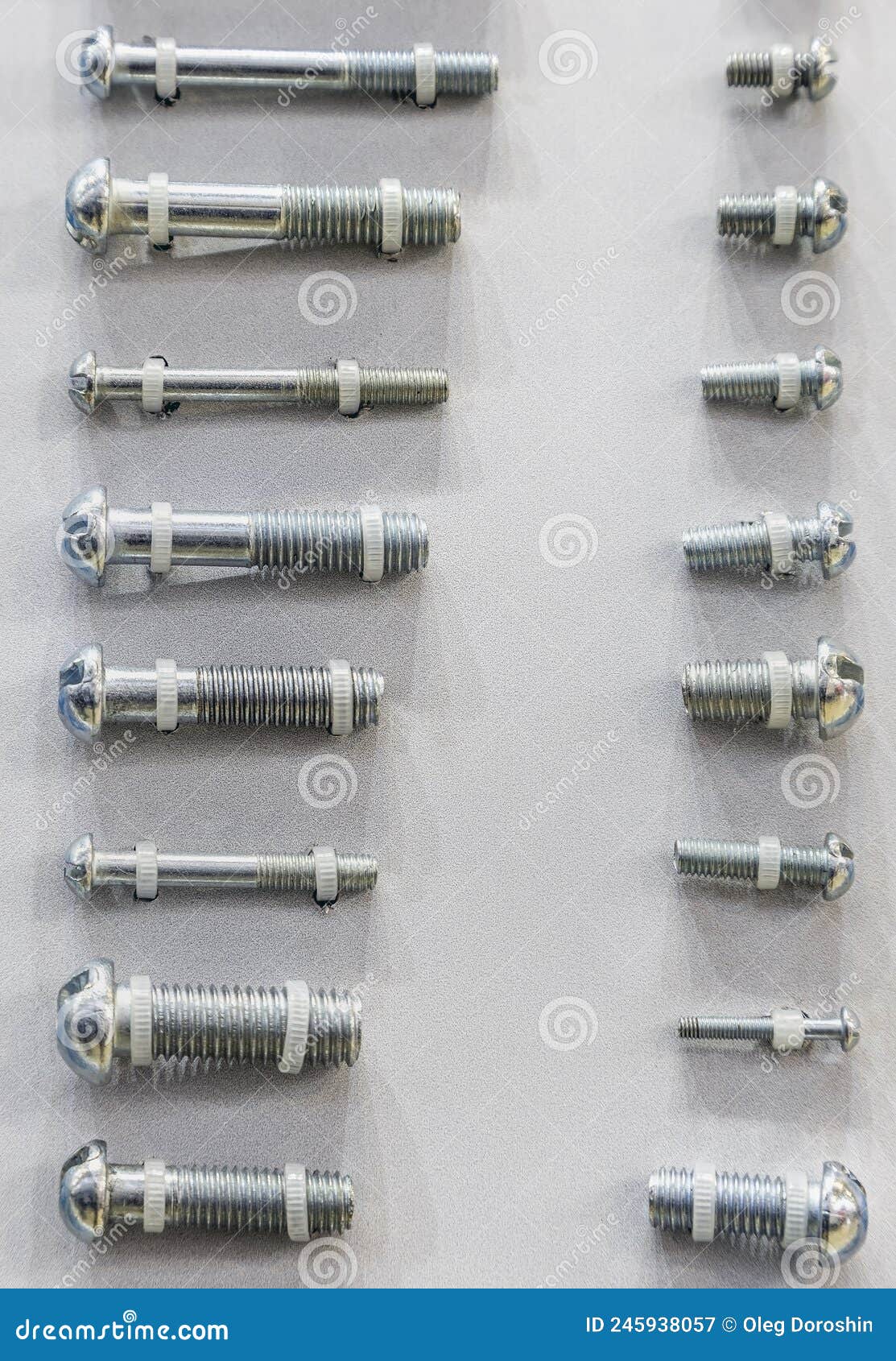 Bolt with Thread of Different Sizes on the Counter As a Sample Stock ...