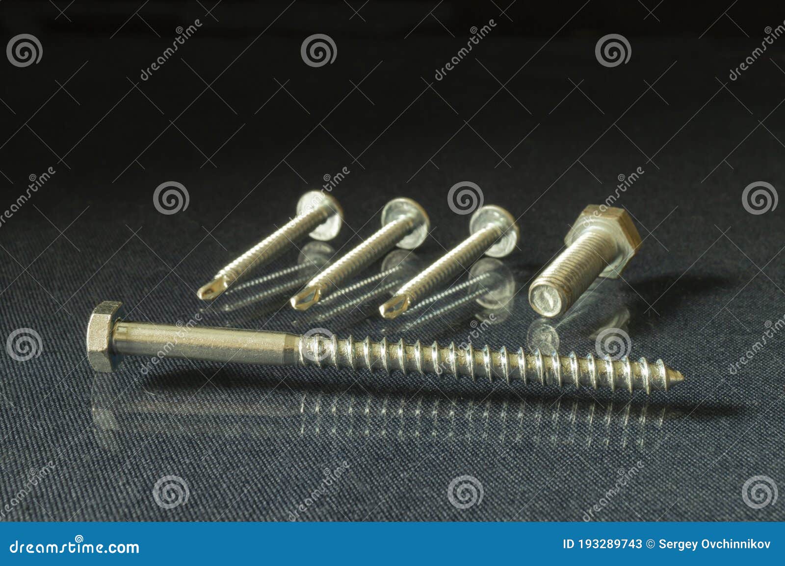 Bolt with Thread by Nut and Puck on Table with Reflection Stock Image ...