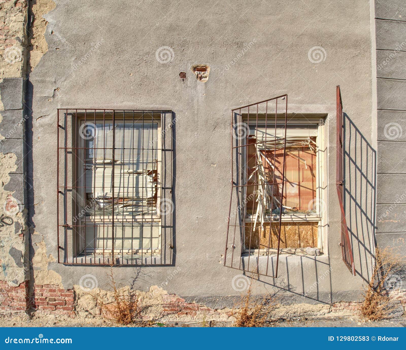Bolted Windows And A Walled Door On The Facade Of Building Royalty-Free ...