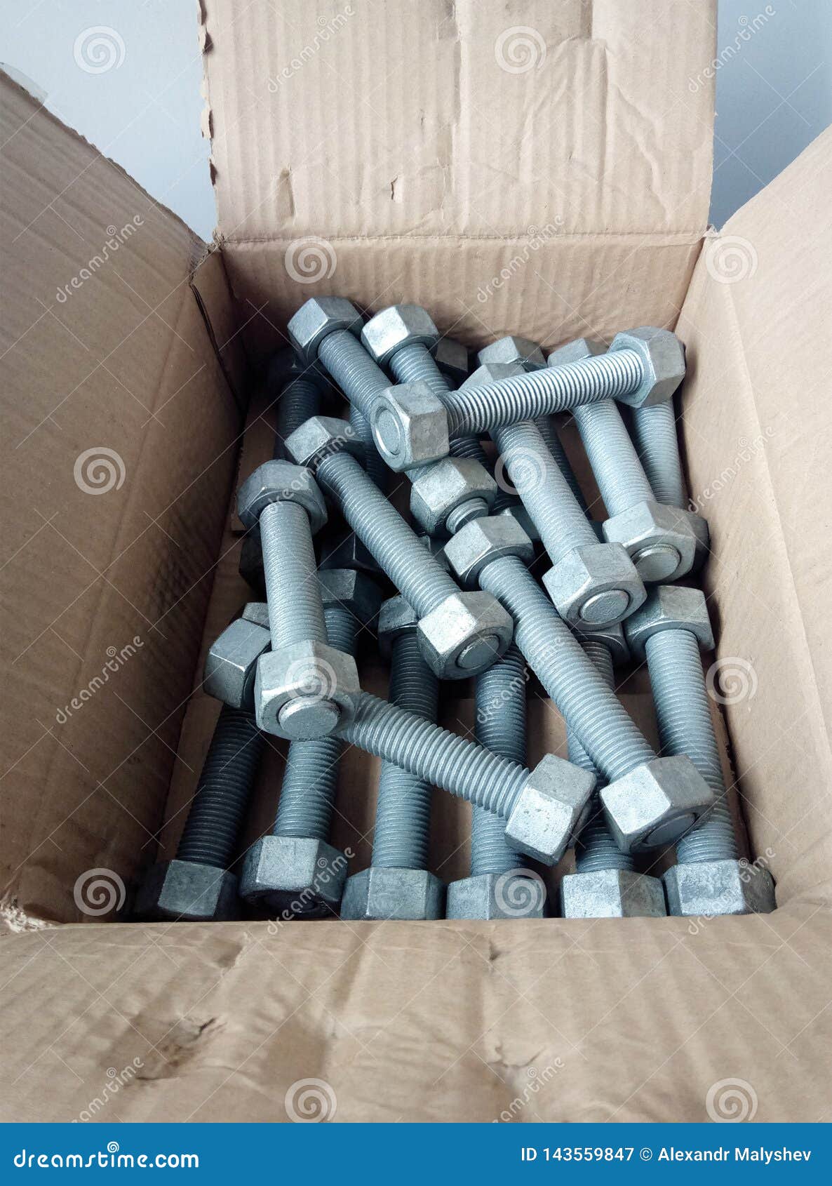 Bolts in the box stock image. Image of thread, together - 143559847