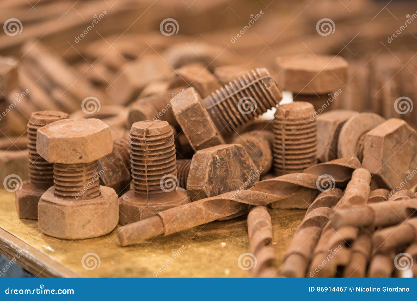 Bolts and Nuts with Chocolate Stock Image - Image of nuts, desk: 86914467