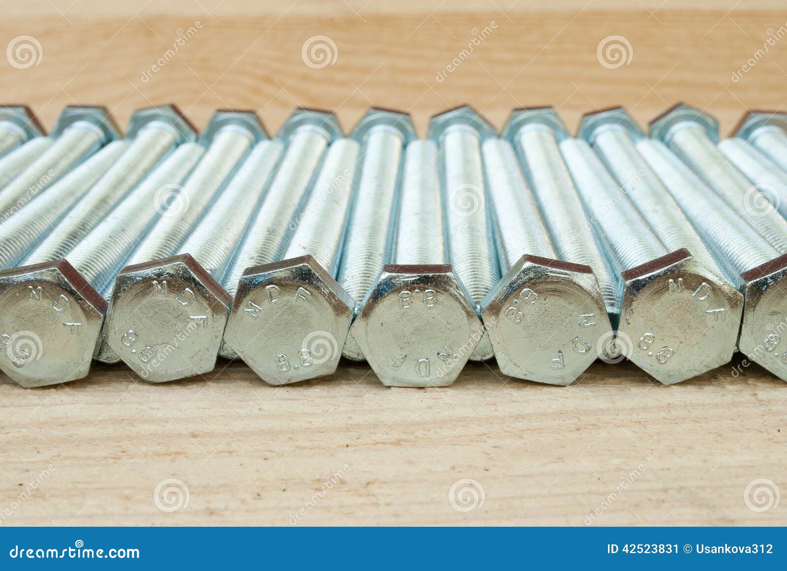 Bolts on wood stock image. Image of engineering, angle - 42523831