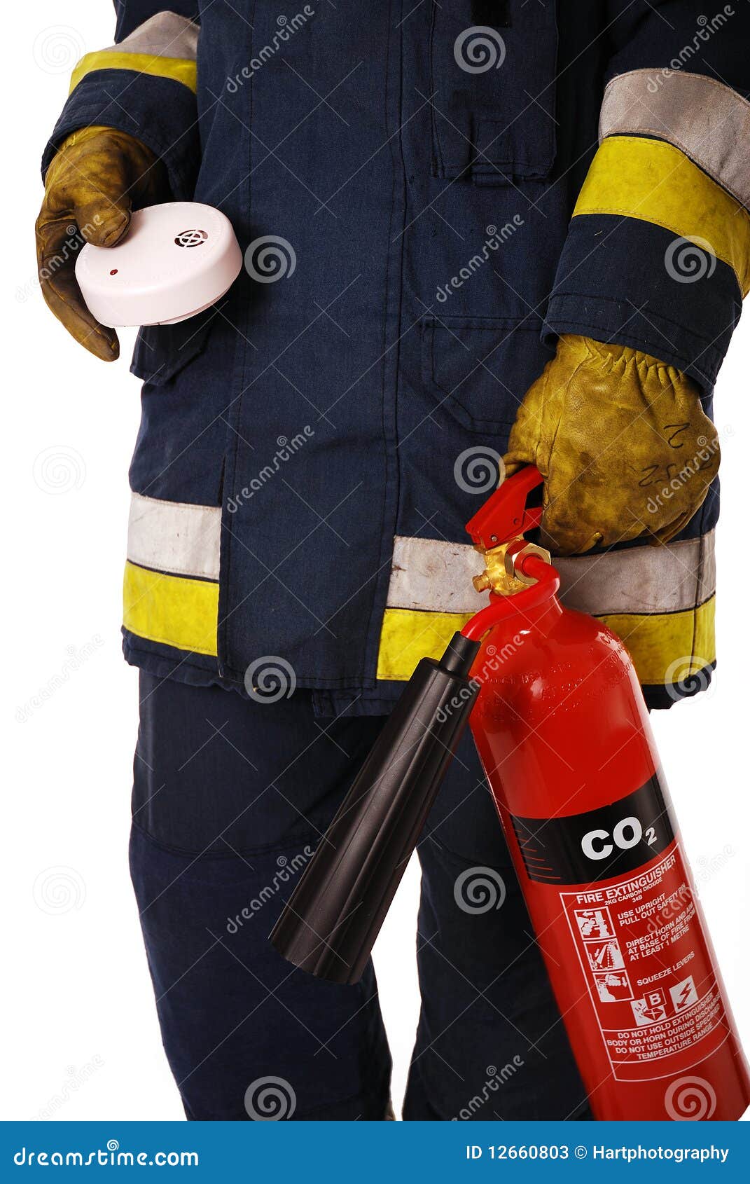 Bombero con el extintor imagen de archivo. Imagen de brigada - 12660803