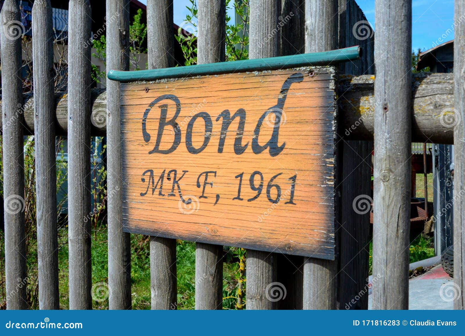 Bond MKF 1961 Lettering on a Wooden Fence Editorial Stock Photo - Image ...