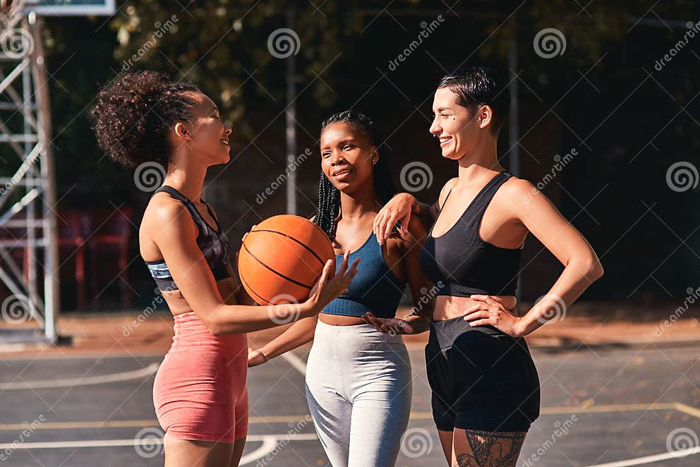 We Bond Through Sport A Diverse Group Of Sportswomen Bonding After A
