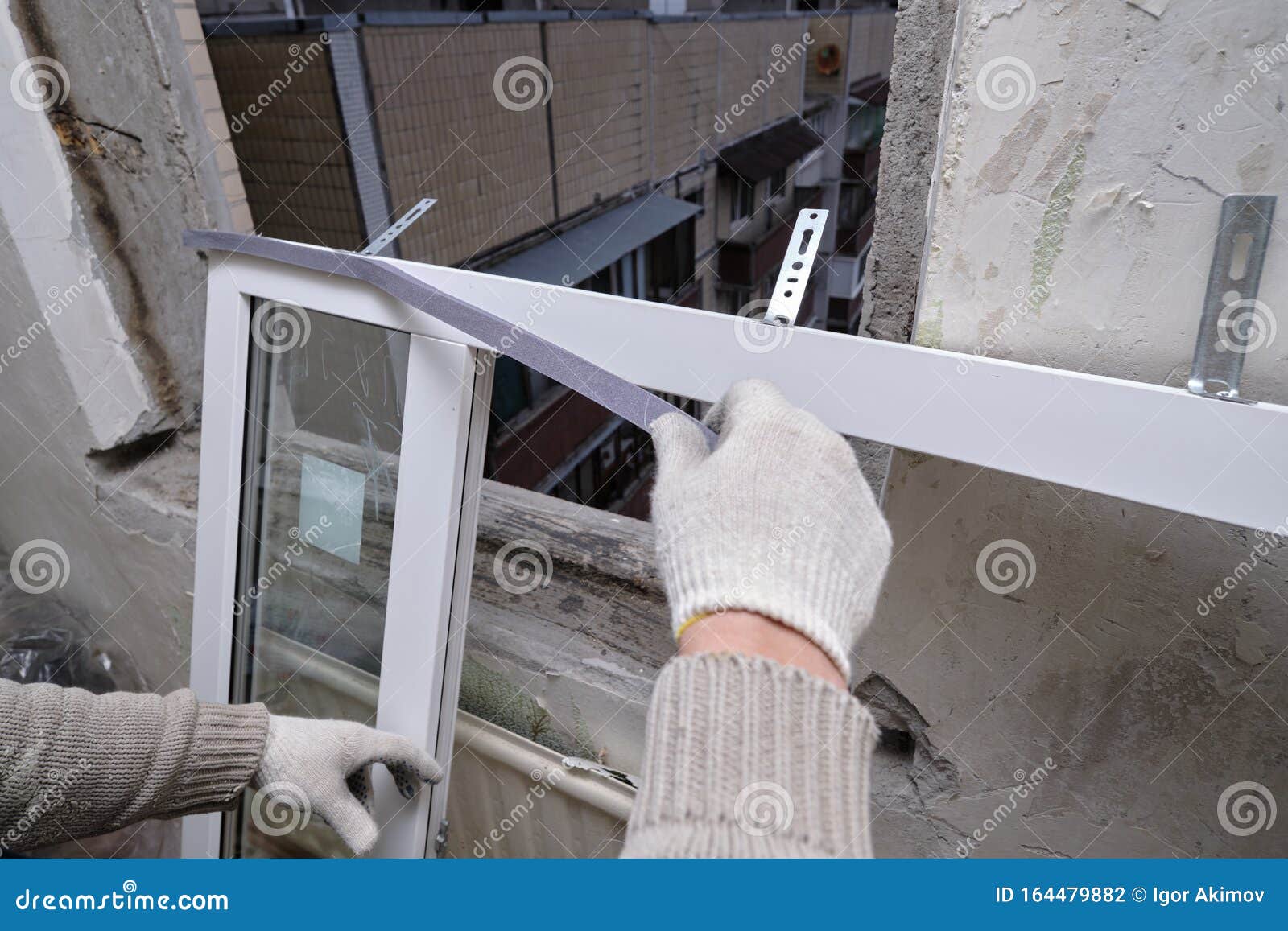 Bonding Insulating Tape To a Plastic Window during Installation Stock ...