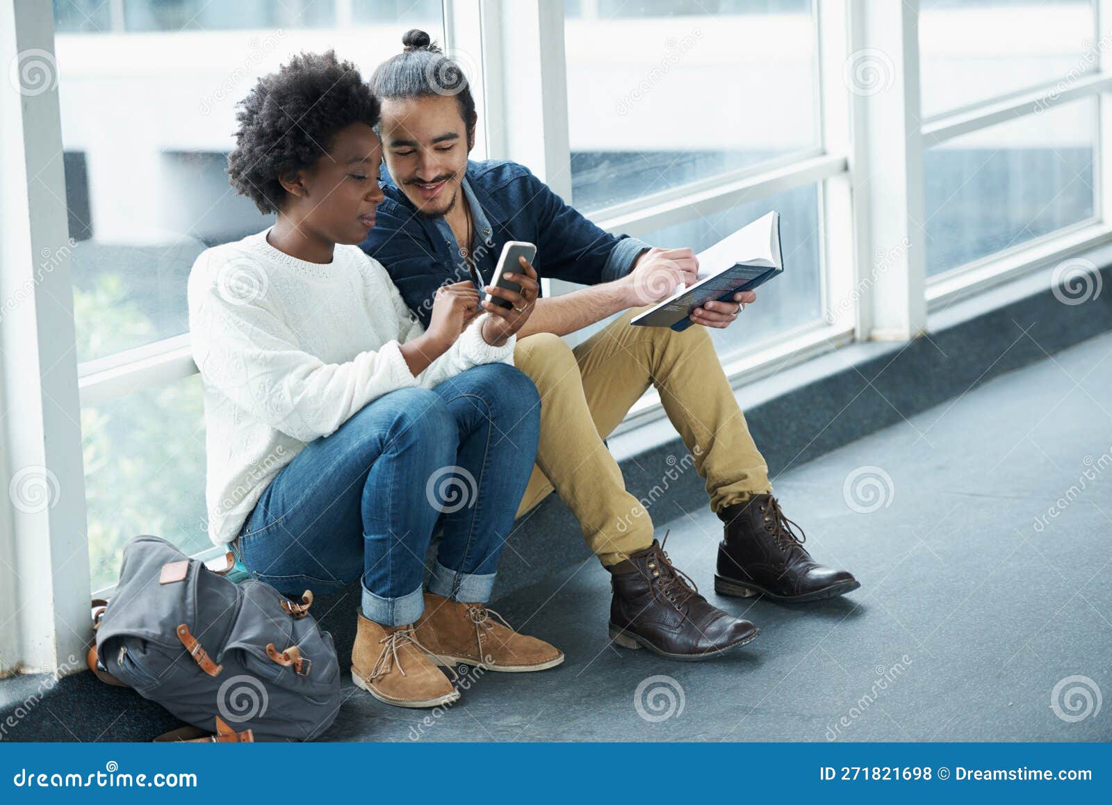Bonding Over Knowledge. a College Couple Sitting Closely Together ...