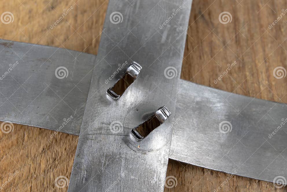 Bonding a Sheet Metal Using a Crimper. Small Locksmith Works in Stock ...