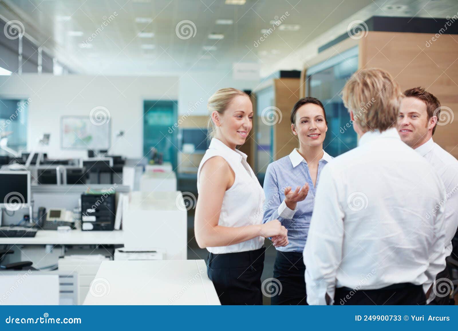 Bonding at Work. Business Coworkers Standing Together and Chatting ...