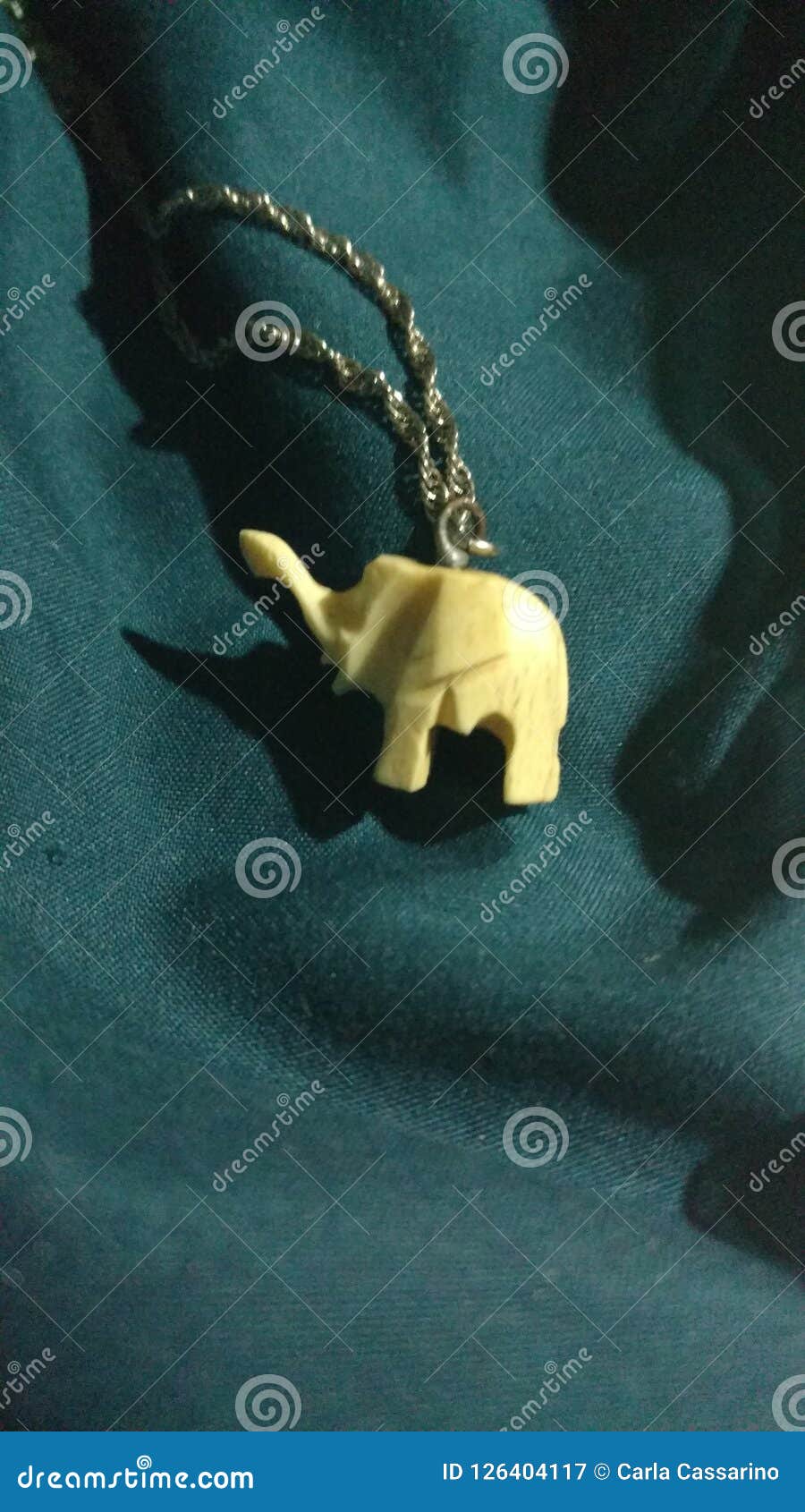 Elephant Ivory Craved Model Of Sitting Emperor Isolated On White ...