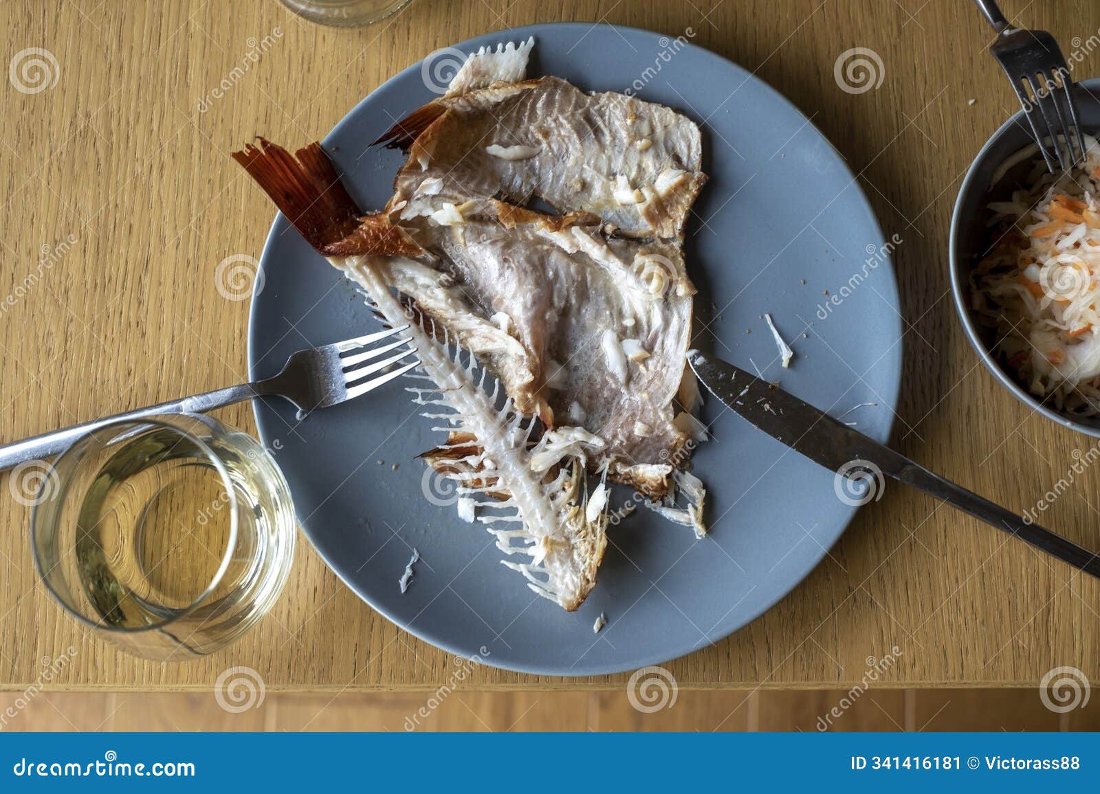 Bones and Skin of the Eaten Fish Stock Image - Image of skin, leftovers ...