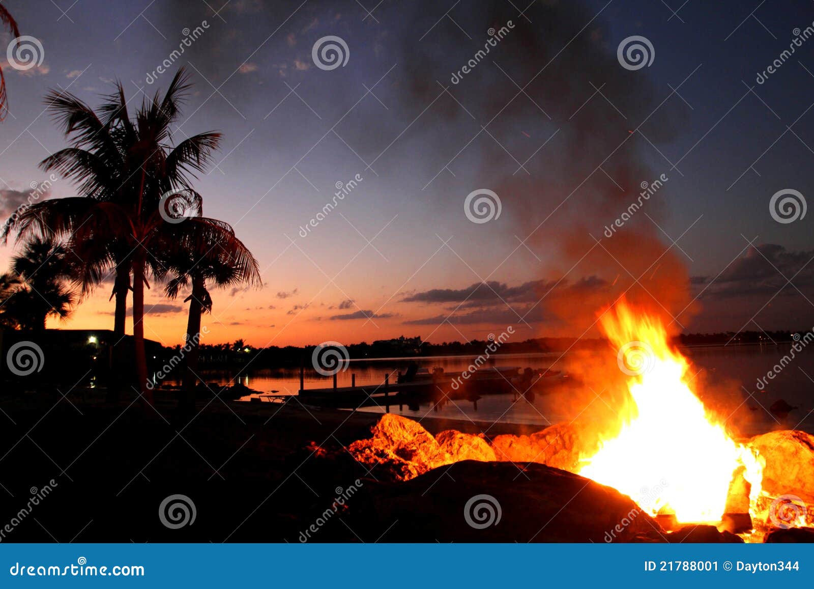 Bonfire at Lake stock image. Image of fire, water, blue - 21788001
