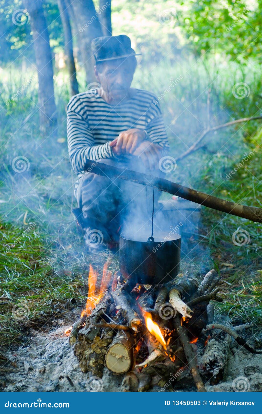 Bonfire and man 1 stock image. Image of ember, burn, forest - 13450503