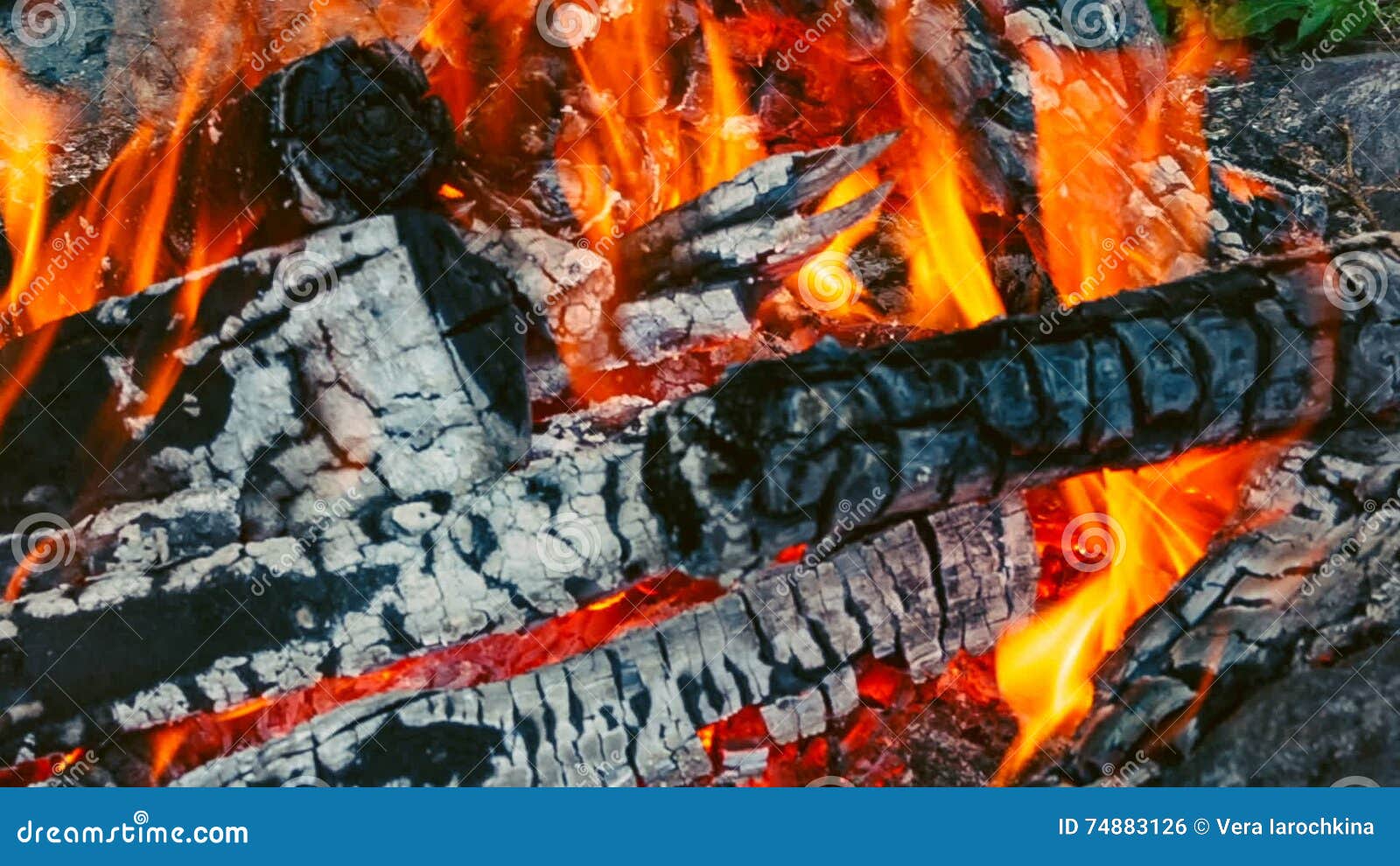 Bonfire. Smoldering Logs. Embers. Two Logs are Falling Out of the Fire ...