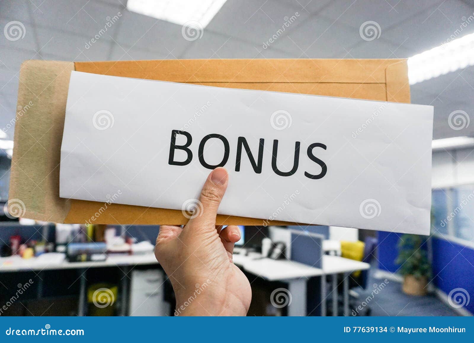 Bonus from the envelope stock photo. Image of financial - 77639134