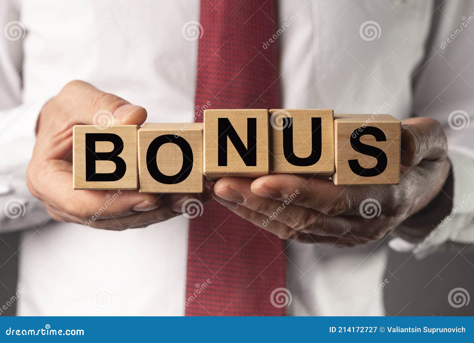 Bonus Word on Cubes in Male Hands Stock Image - Image of profit ...