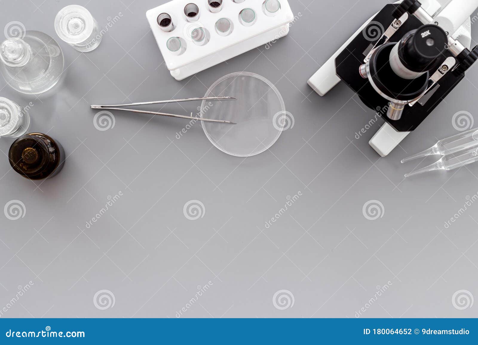 Bood Testing with Microscope in Laboratory. Equipment on Grey ...