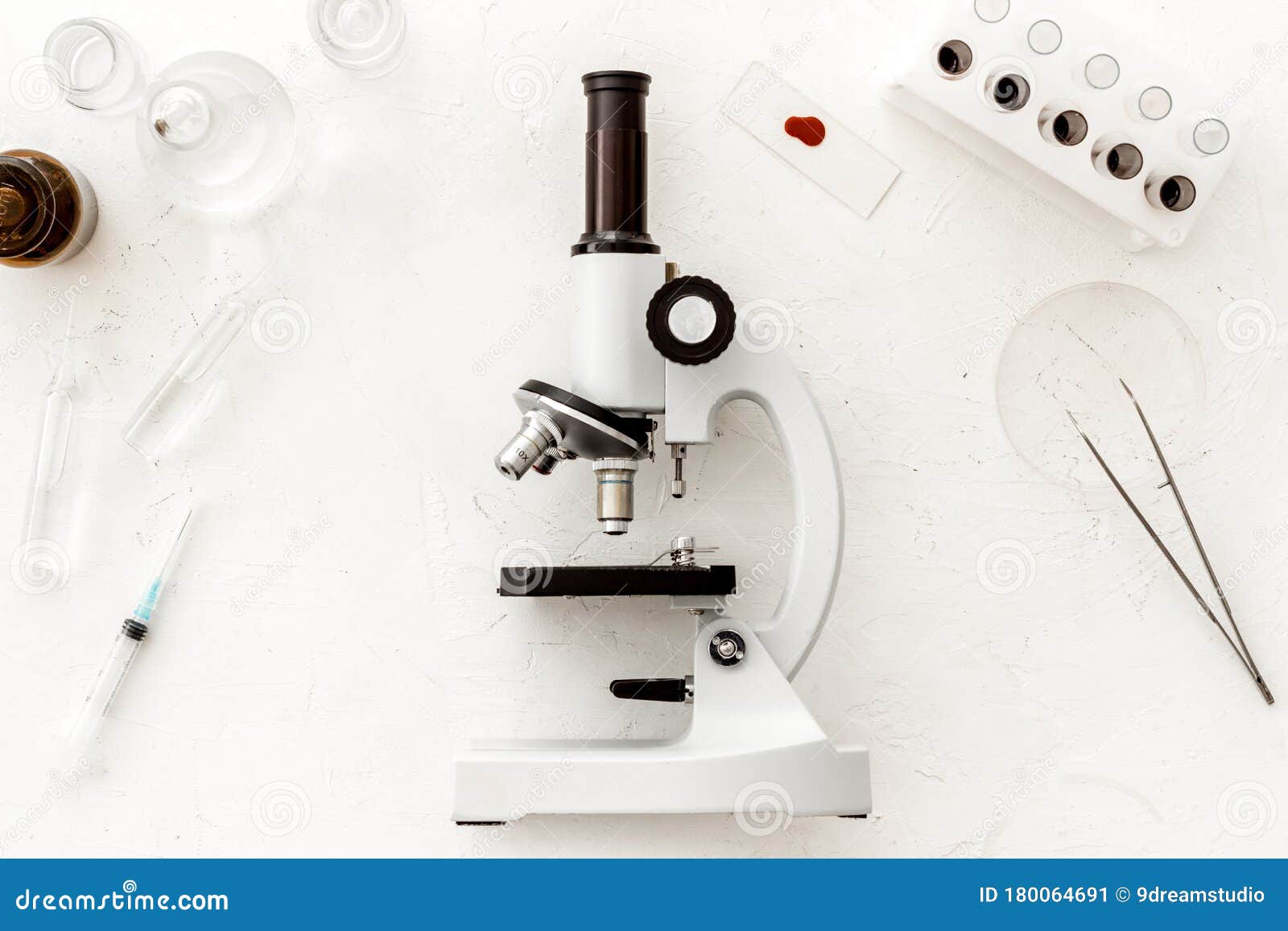 Bood Testing with Microscope in Laboratory. Equipment on White ...