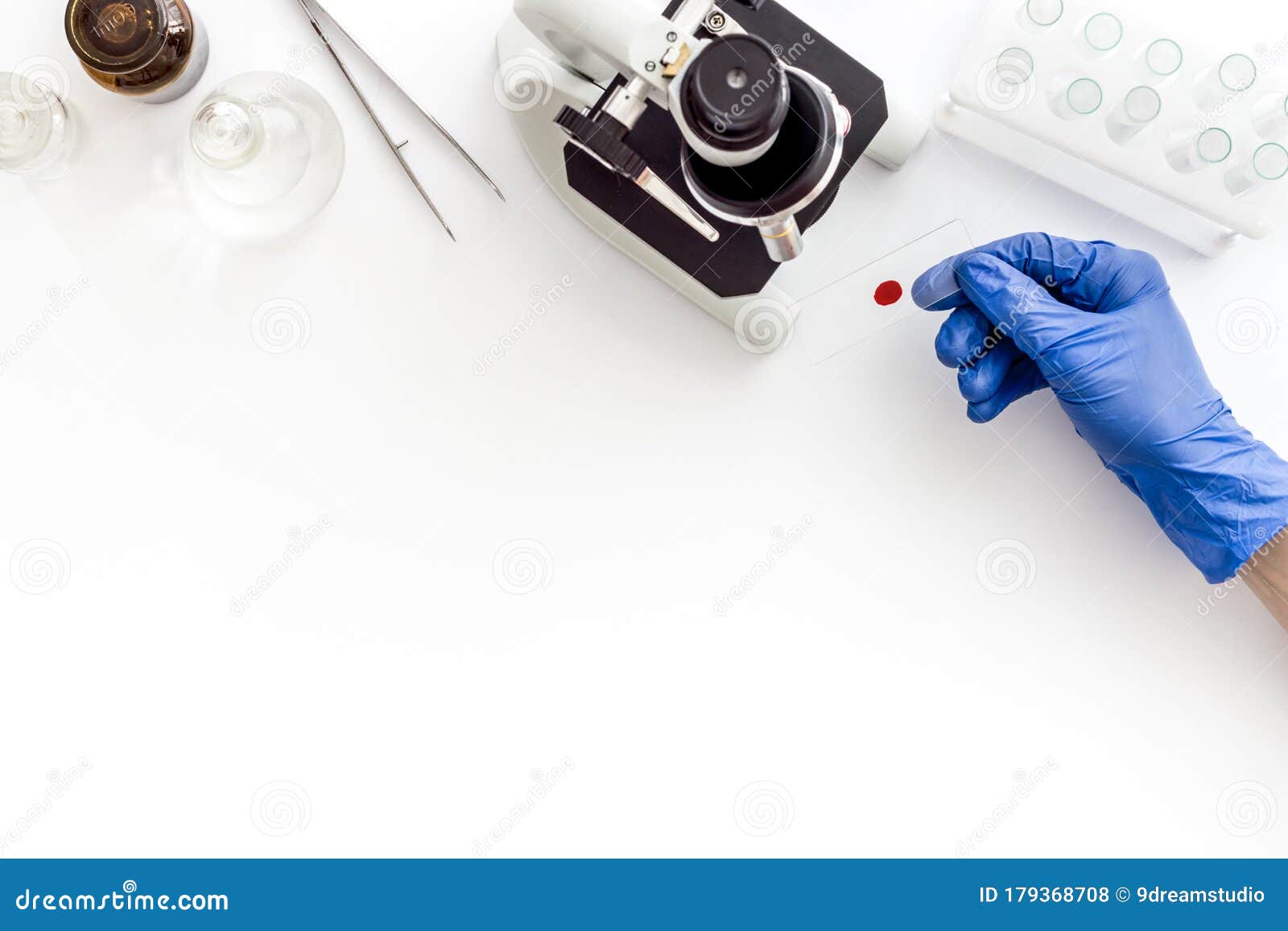 Bood Testing with Microscope in Laboratory. Sample in Hands on White ...