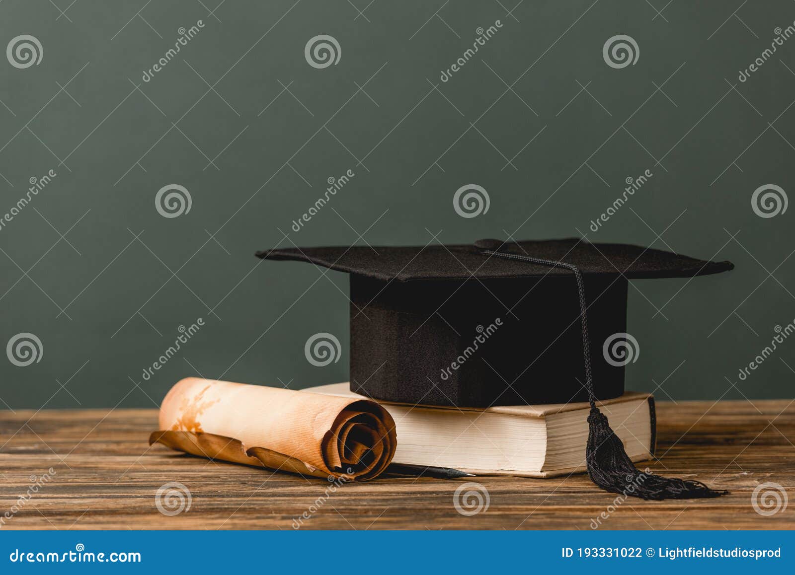 Book, Academic Cap and Scroll on Wooden Surface Stock Photo - Image of ...
