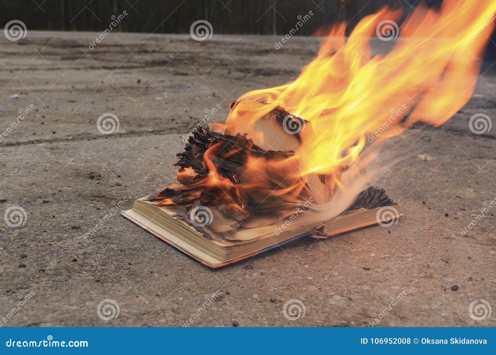 Book with Burning Pages on a Concrete Surface Stock Photo - Image of ...